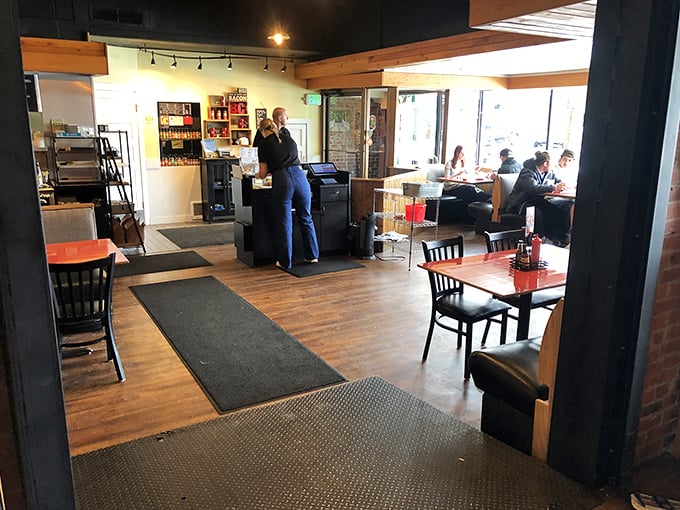 Where breakfast dreams come true. Warm wooden floors, cozy seating, and the promise of morning delights that'll make you forget all about your afternoon plans.