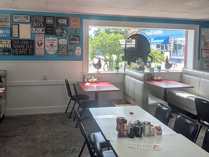 Inside, the walls speak breakfast wisdom while rooster decorations stand guard. It's like dining in your favorite aunt's kitchen—if she could cook for 50.