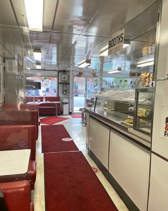 Red vinyl booths worn to a perfect patina by generations of diners. This isn't manufactured nostalgia&mdash;it's the real deal.