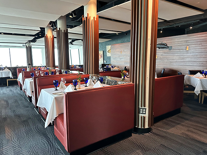 Floor-to-ceiling windows mean every seat gets the show, and Lake Erie never phones in a performance.