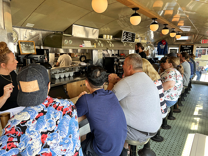Counter culture at its finest – where strangers become temporary neighbors and everyone has front-row seats to the breakfast ballet.