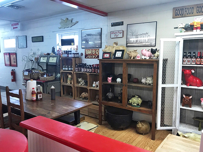 Pig figurines stand guard over shelves of sauce bottles in this no-frills interior where barbecue is religion and d&eacute;cor is delightfully secondary.