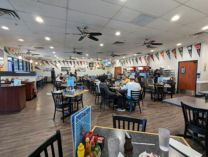 Sports pennants and simple decor create that perfect neighborhood vibe&mdash;where the focus stays squarely on what matters: the food on your plate.