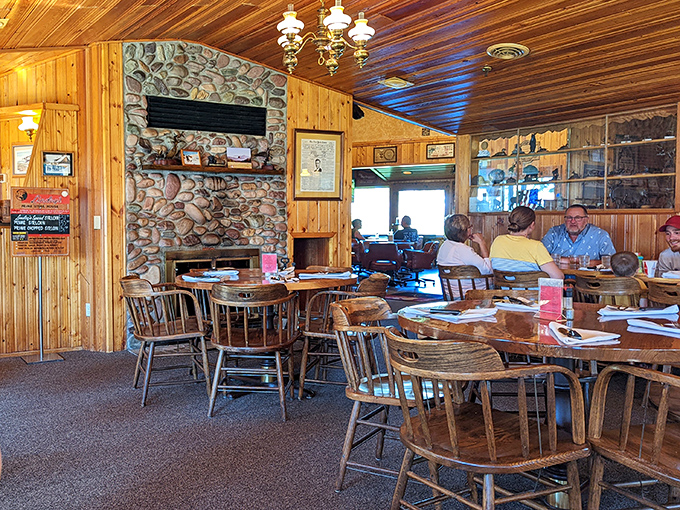 Where wood paneling meets culinary magic. The stone fireplace and warm wooden interior create the perfect backdrop for the steak-centered memories you're about to make.