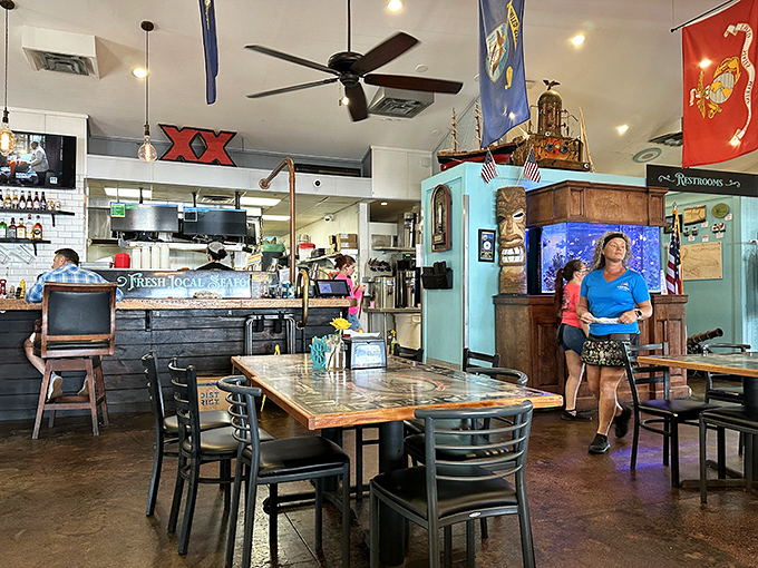Inside, nautical flags hang from the ceiling while rustic wood tables invite you to settle in for a feast that honors Jacksonville's maritime heritage.