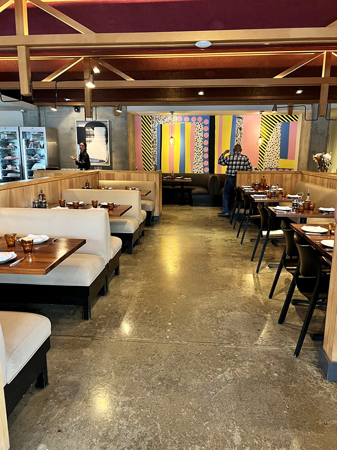Inside, light wood booths and concrete floors create that perfect "I'm-hip-but-here-for-the-food" vibe. The colorful mural says Venice; everything else whispers "serious eats."