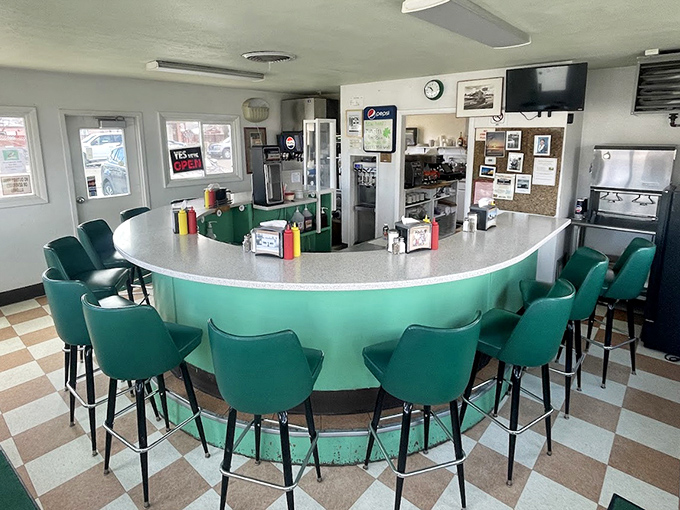 Step into burger paradise with this classic curved counter and turquoise stools &ndash; the kind of place where calories don't count and memories are made.
