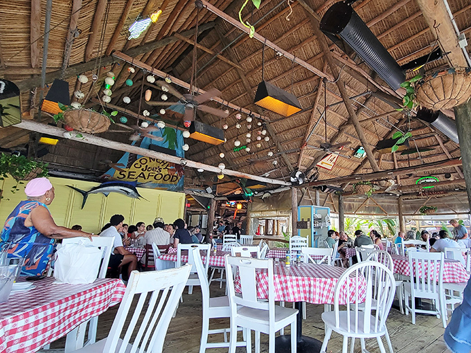 Beneath that magical thatched roof, checkered tablecloths and happy diners create the perfect symphony of "vacation mode activated."