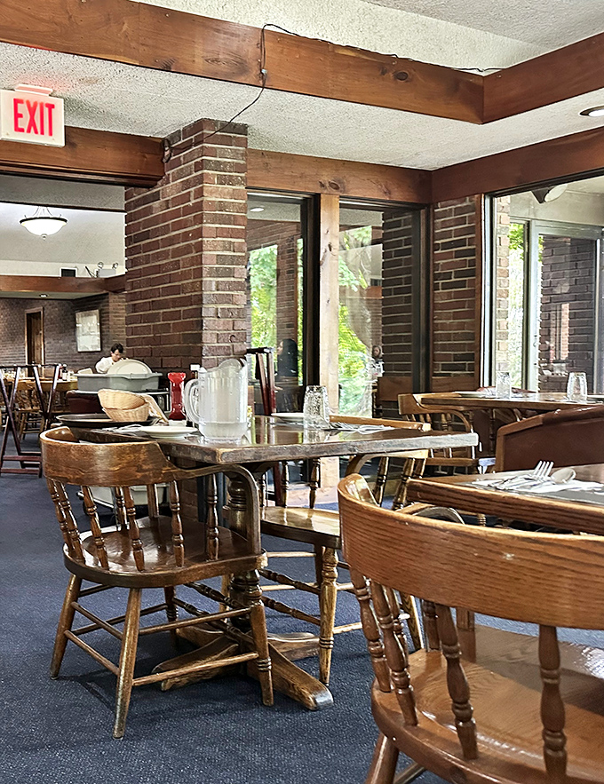 Wooden captain's chairs and sturdy tables create that perfect lived-in atmosphere where comfort trumps pretension and conversations flow as freely as the coffee.