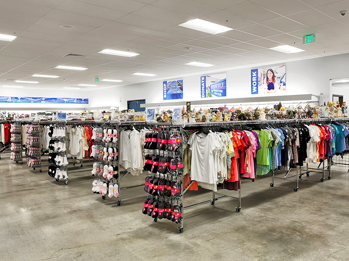 Organized chaos at its finest&mdash;racks of possibility await as shoppers navigate the colorful landscape of secondhand fashion finds.