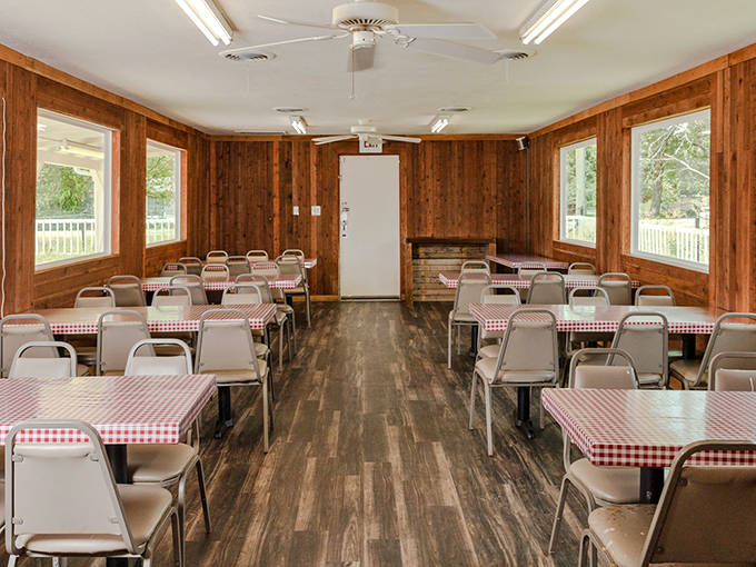 Simple wooden walls and red-checkered tablecloths create the perfect backdrop for barbecue greatness. No white tablecloths needed when the food is this good.