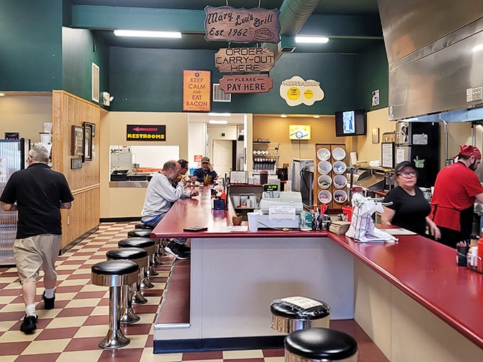 Classic diner perfection with checkered floors and counter seating where strangers become friends over coffee and conversation.