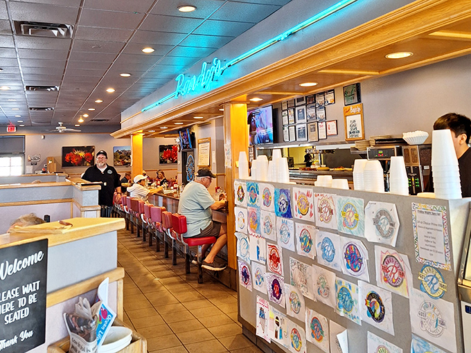 The counter seating at Randy's offers front-row tickets to the culinary show, where breakfast dreams come true and coffee cups never run empty.