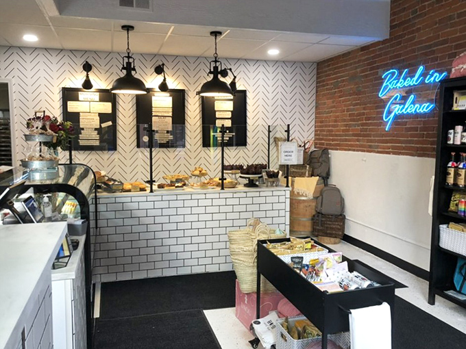 Modern meets vintage inside with herringbone walls, subway tile, and that irresistible "Baked in Galena" neon calling your name.