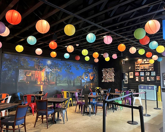 Step inside and you're greeted by a kaleidoscope of colorful lanterns, creating a festive vibe that says, "This isn't your typical serious BBQ joint &ndash; we have fun here!"