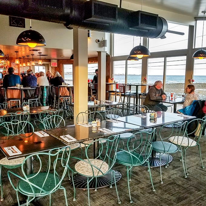 Where ocean views meet comfort dining. The seafoam green chairs aren't just stylish&mdash;they're front-row seats to nature's greatest show.