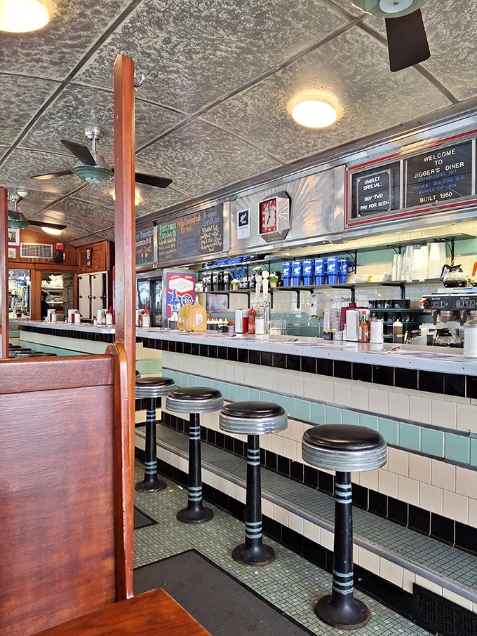 Classic counter seating where breakfast dreams come true. Those vintage stools have witnessed more morning revelations than a therapist's couch.
