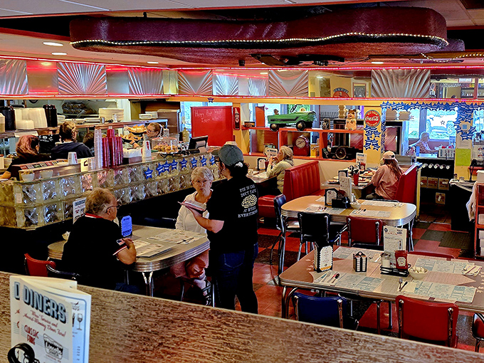 Step inside and time rewinds to the golden age of diners. Glass blocks, chrome accents, and red vinyl booths create the perfect backdrop for comfort food conversations.