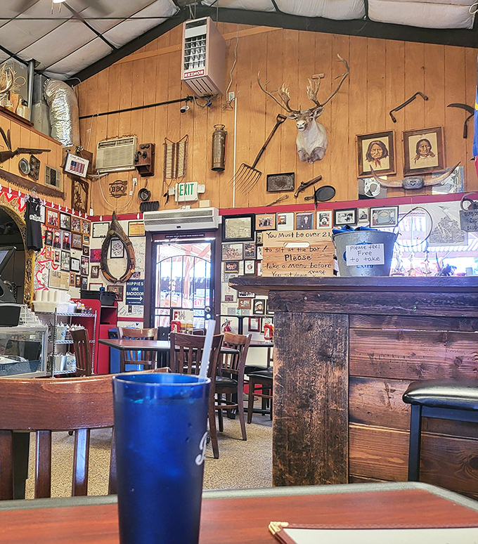 Step inside and you're greeted by wood-paneled walls adorned with decades of memories&mdash;where every mounted trophy and framed photo tells a story.