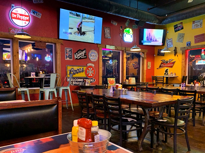 Vibrant red and yellow walls adorned with memorabilia create that perfect "come as you are" atmosphere where serious BBQ business happens.