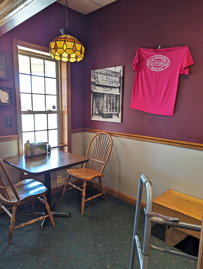 Inside, purple walls and vintage charm transport you to simpler times. That Tiffany-style lamp isn't illuminating fine art&mdash;it's lighting the way to butter paradise.