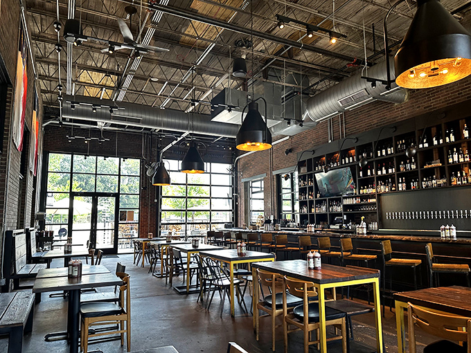 Industrial-chic meets Southern comfort in this airy dining space where garage doors open to connect indoor and outdoor worlds&mdash;just like good barbecue connects strangers.