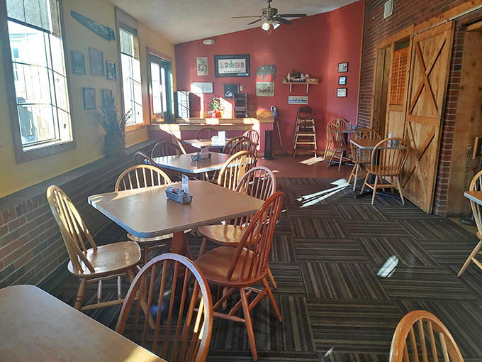 Step inside where Windsor chairs and warm walls create the kind of cozy atmosphere that makes strangers into regulars.