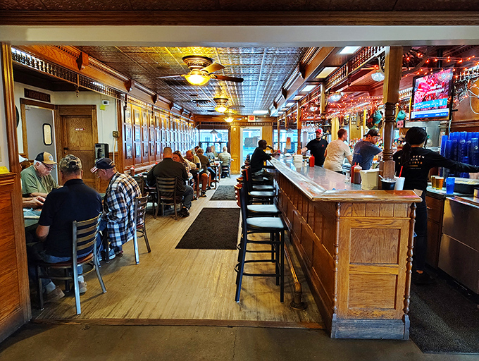 Wood-paneled walls and a welcoming bar where strangers become friends over perfectly charred beef and cold beer.