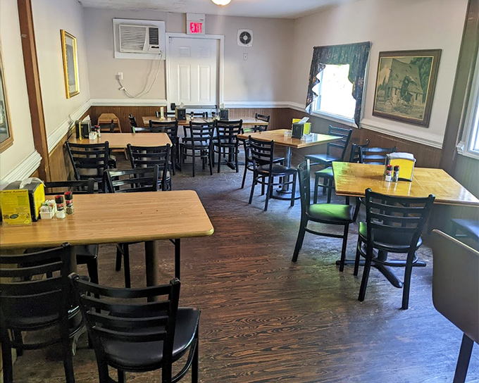 Simple tables and honest chairs create the kind of comfortable dining room where the food does all the talking.