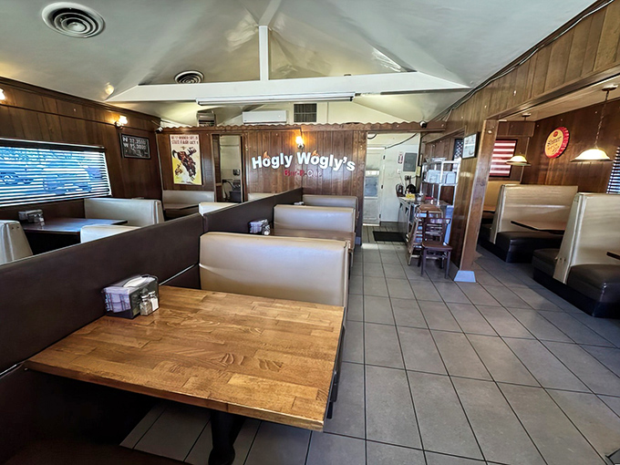 Wood-paneled walls that have absorbed decades of smoky stories. The booths aren't fancy, but they've cradled countless barbecue dreams to completion.