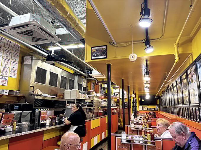 Inside, the narrow counter seating puts you right in the action &ndash; yellow walls and bustling servers create the perfect diner symphony.