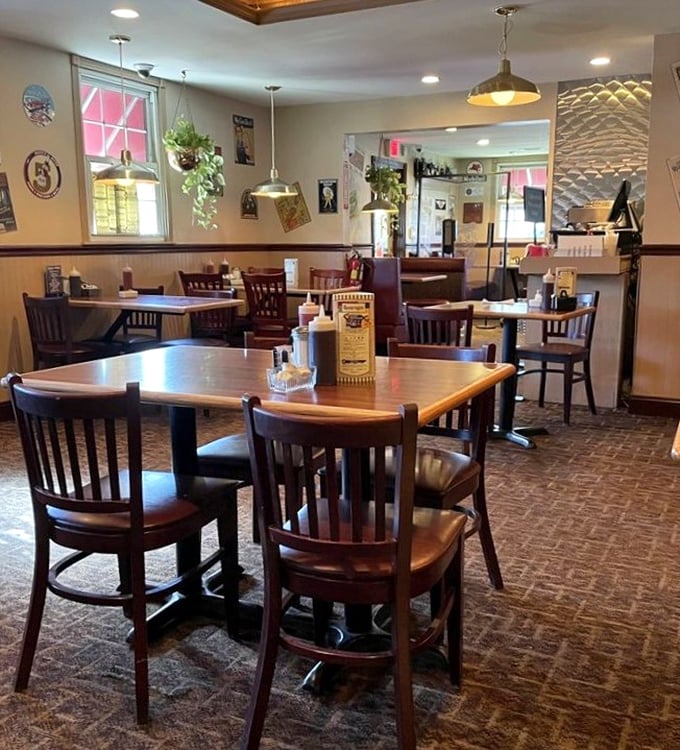 Classic diner ambiance done right&mdash;wooden chairs, hanging plants, and that unmistakable feeling you've just walked into your favorite aunt's kitchen.