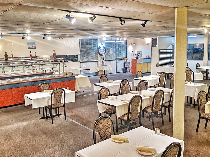 Simple white tablecloths and comfortable seating set the stage for culinary drama where the food, not the decor, deserves the standing ovation.
