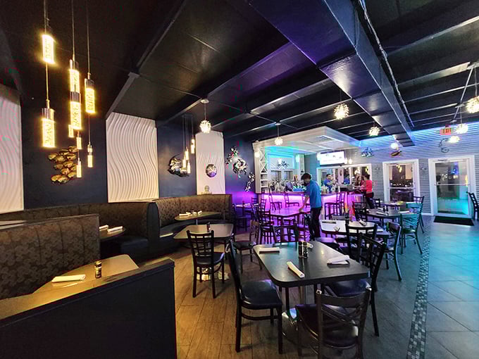 Step inside to a sea of blues and modern lighting that feels like dining underwater—minus the need for scuba gear or awkward conversations with fish.