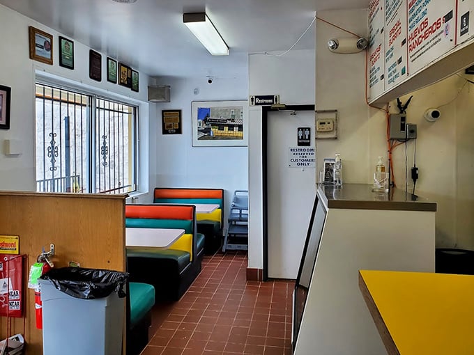 Inside, colorful booths and no-nonsense decor tell you everything you need to know: this place prioritizes substance over style, just as the culinary gods intended.