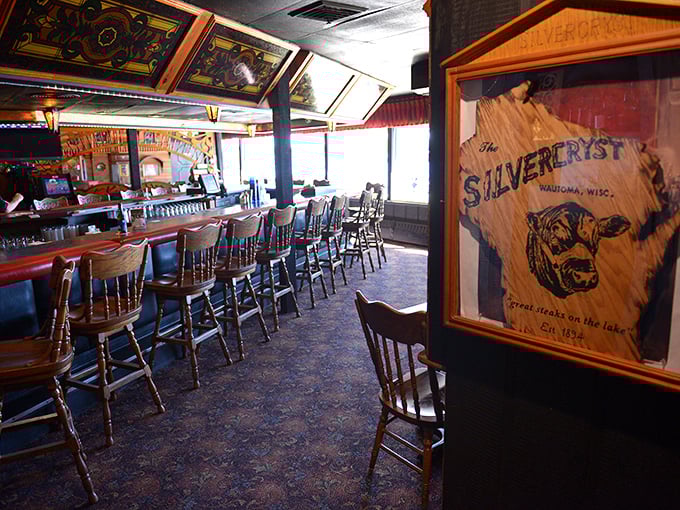 The classic horseshoe bar at Silvercryst invites patrons to settle in for stories and Wisconsin's unofficial state cocktail.