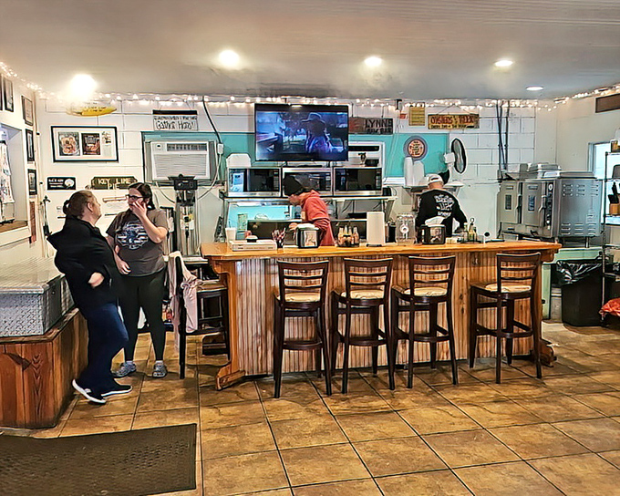 Inside, the wooden bar is where the magic happens. No fancy mixologists here&mdash;just skilled hands that have shucked more oysters than most people have had hot dinners.