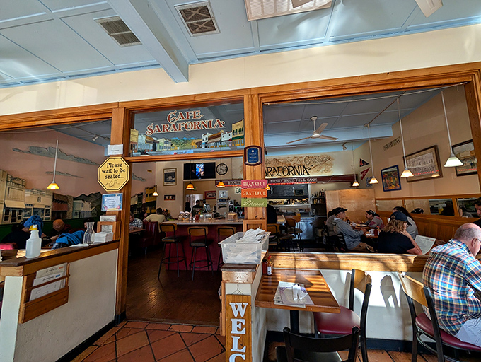 Inside, the warm wood tones and blue ceiling create that perfect small-town caf&eacute; vibe where regulars and first-timers alike feel instantly at home.