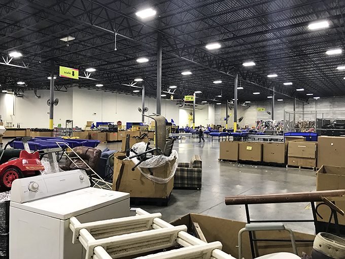 Welcome to the land of infinite possibilities. Blue bins stretch to the horizon like an ocean of potential second chances.