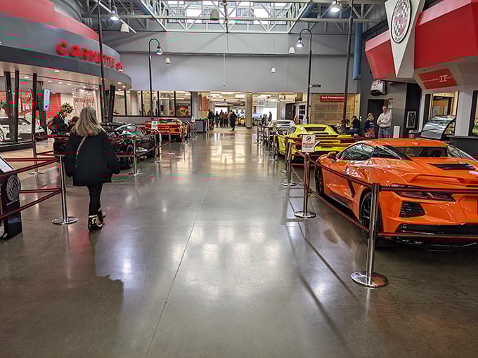 Inside, a rainbow of Corvettes lines the polished floors, each one more tempting than the last. It's like walking through automotive heaven.