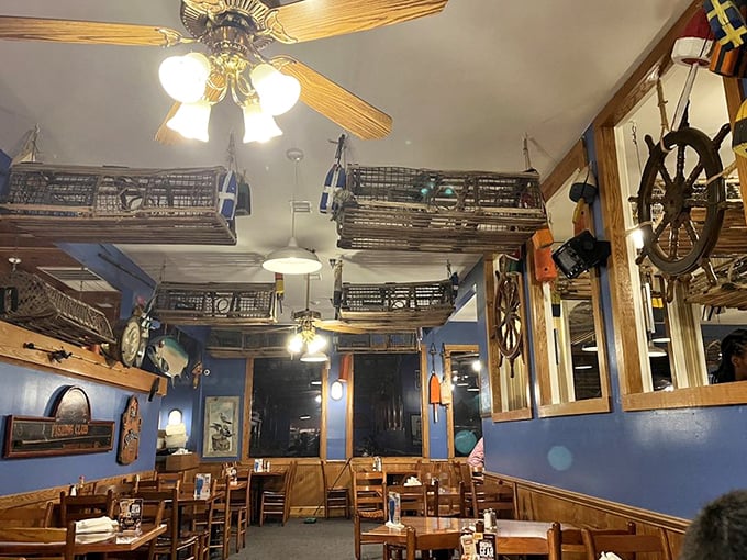 Nautical nostalgia meets dining comfort. The lobster traps and ship wheels aren't just decor &ndash; they're setting the stage for the ocean's bounty to come.