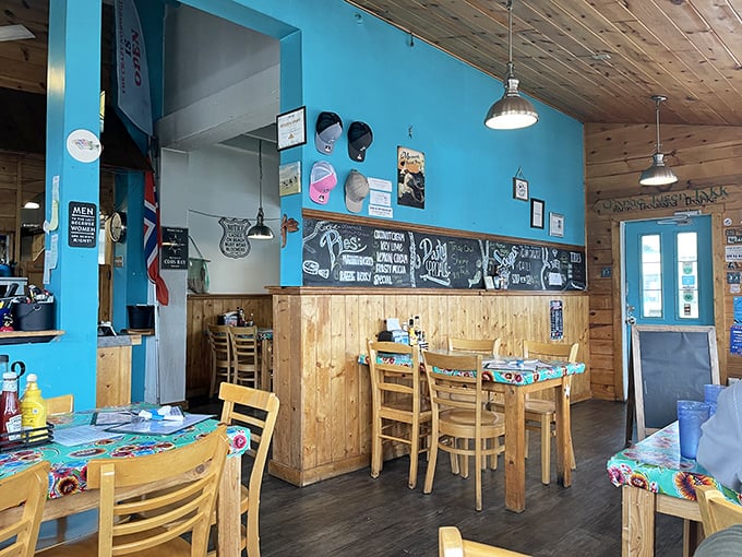 Bright blue walls meet warm wooden accents in this cozy haven. The kind of place where calories don't count and seafood dreams come true.