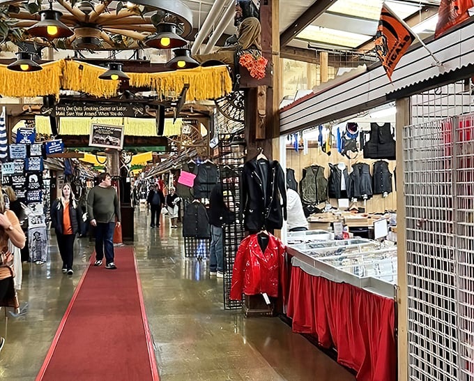 Wagon wheels suspended from the ceiling create a rustic time capsule effect. Walking these aisles feels like stepping through retail dimensions. 