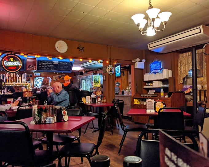 Inside Grumpy's, neon beer signs and simple tables create that perfect "come as you are" atmosphere where the food, not the decor, steals the show.