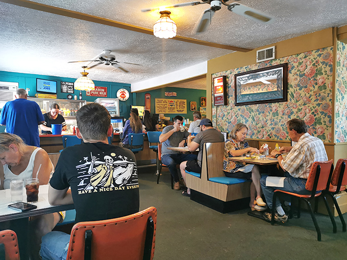 Inside Fred's, time stands still. Ceiling fans lazily spin above booths where strangers become friends over plates of comfort food and endless coffee refills.