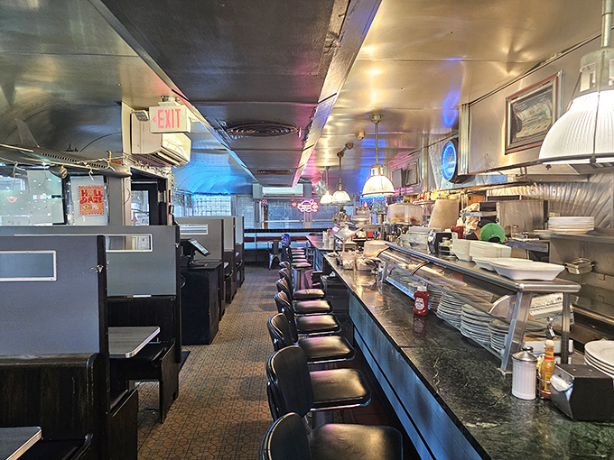 Classic counter seating where breakfast dreams come true. Those spinning stools have supported generations of pancake enthusiasts and coffee philosophers.