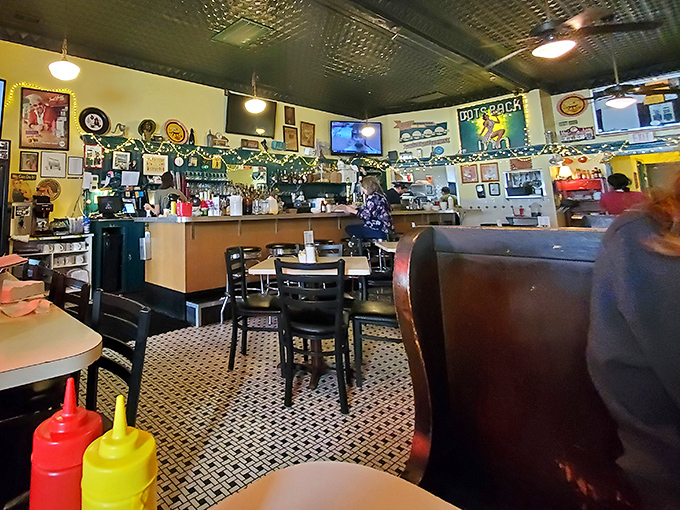 Inside, the classic diner aesthetic—complete with checkered floor and memorabilia-covered walls—creates the perfect backdrop for breakfast magic.