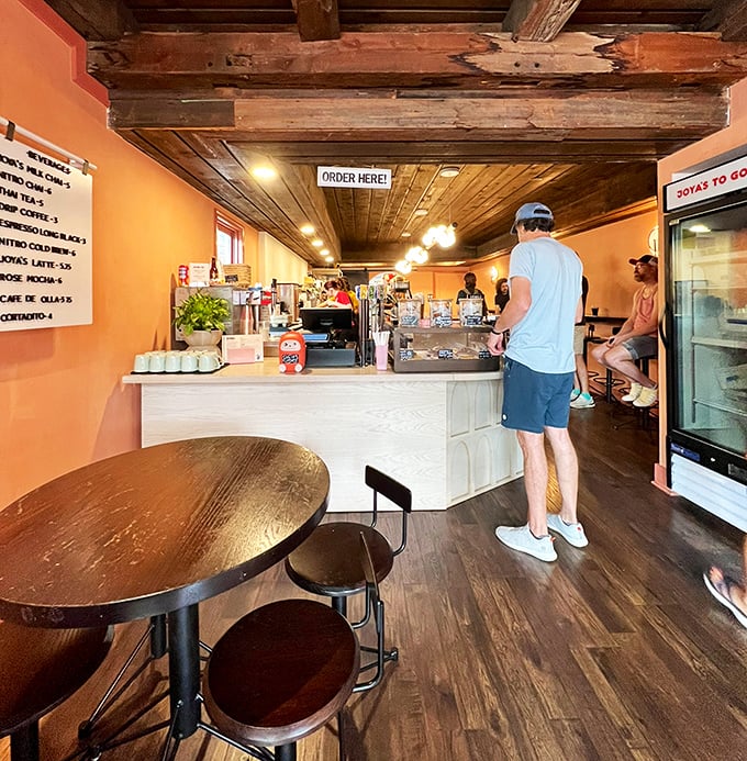 Inside, warm orange walls and rustic wooden beams create the perfect backdrop for morning magic. Order here, but prepare for tough decisions.