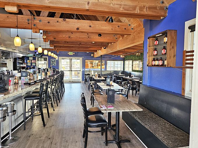 Blue walls and exposed wooden beams create that perfect "I'm definitely getting fresh seafood" atmosphere that makes you instantly hungry.