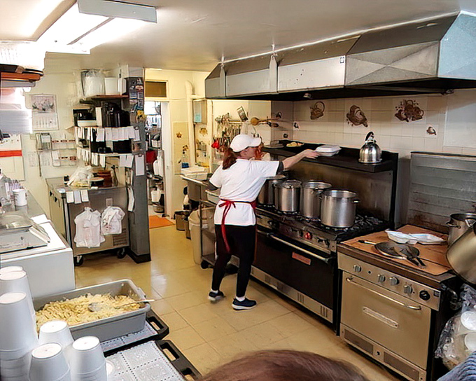 Where the magic happens. Those hands have probably pinched more dough in a day than most of us will in a lifetime.